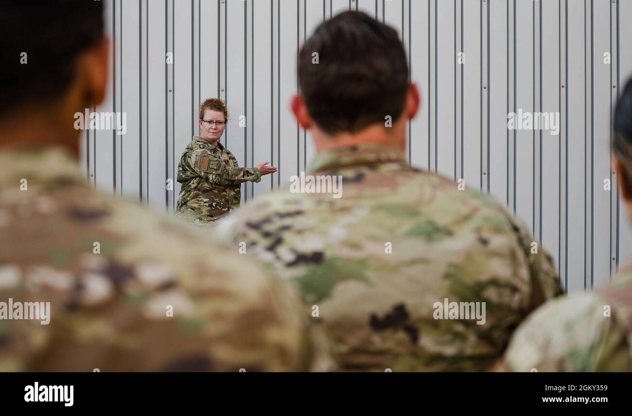 U.S. Air Force Col. Adrienne Williams, 521st Air Mobility Operations Wing commander, gives ...