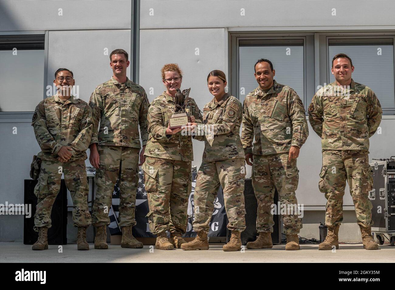 The Enforcers, assigned to the 721st Aerial Port Squadron, hold their ...