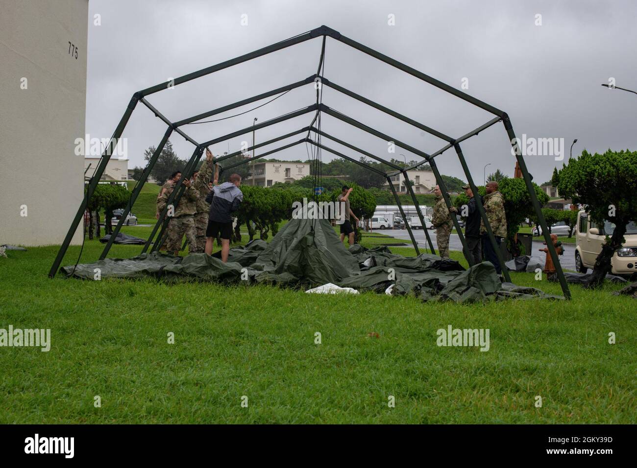 U.S. Air Force Airmen set up a tent for a Command and Control center ...