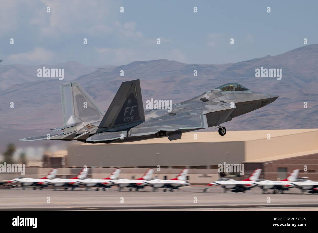 An F-22 Raptor assigned to Joint Base Langley-Eustis, Virginia, takes ...