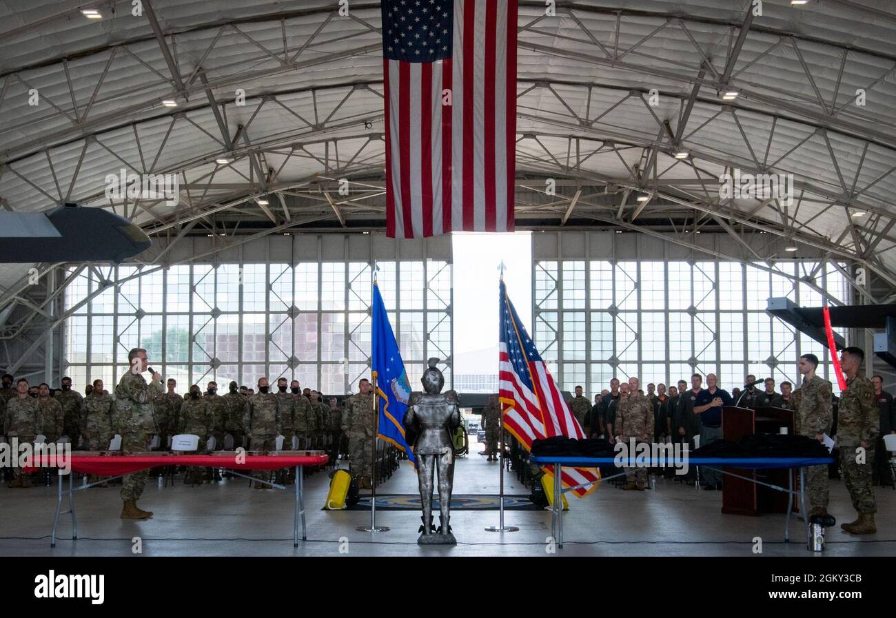 The 96th Maintenance and Operations Group members stand at attention ...