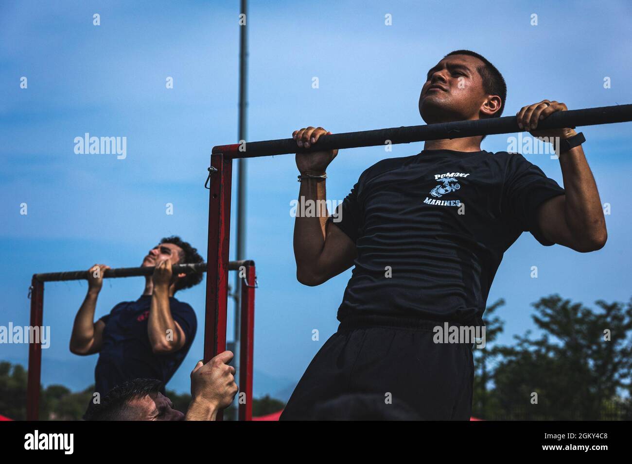U.S. Marine Corps prospects conduct pull-ups during the Recruiting ...