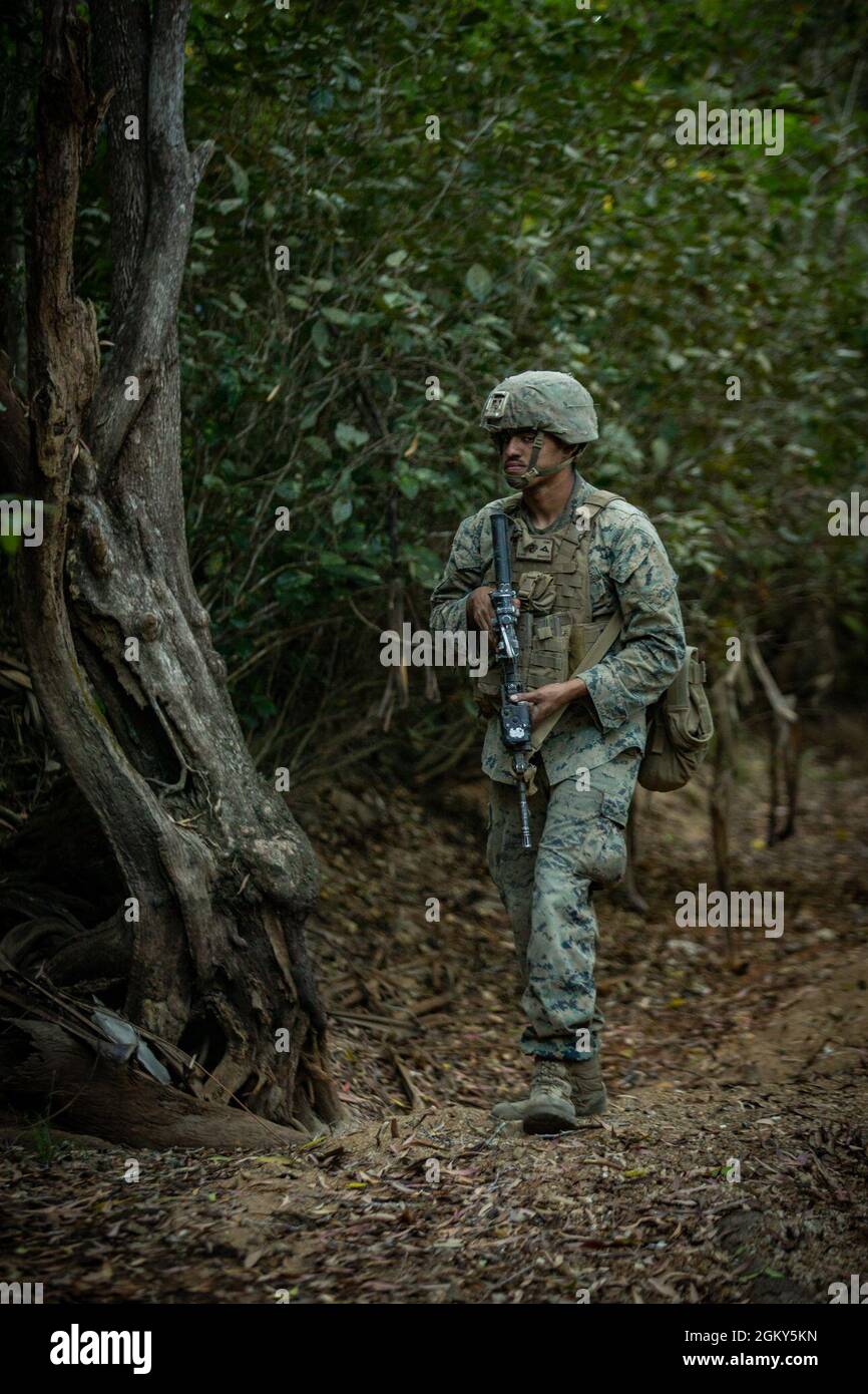 U.S. Marine Corps Lance Cpl. Angel Herradora, a cannoneer with Golf ...