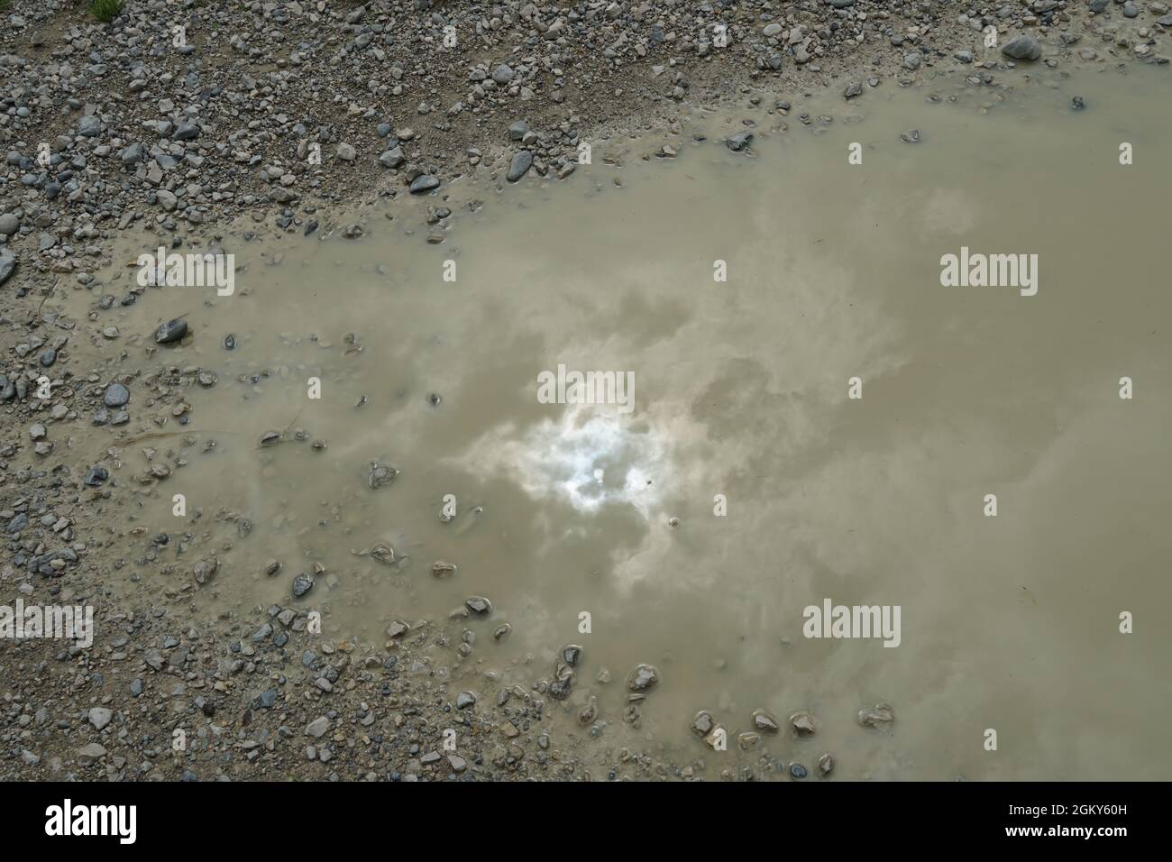 Pothole filled with rain hi-res stock photography and images - Alamy