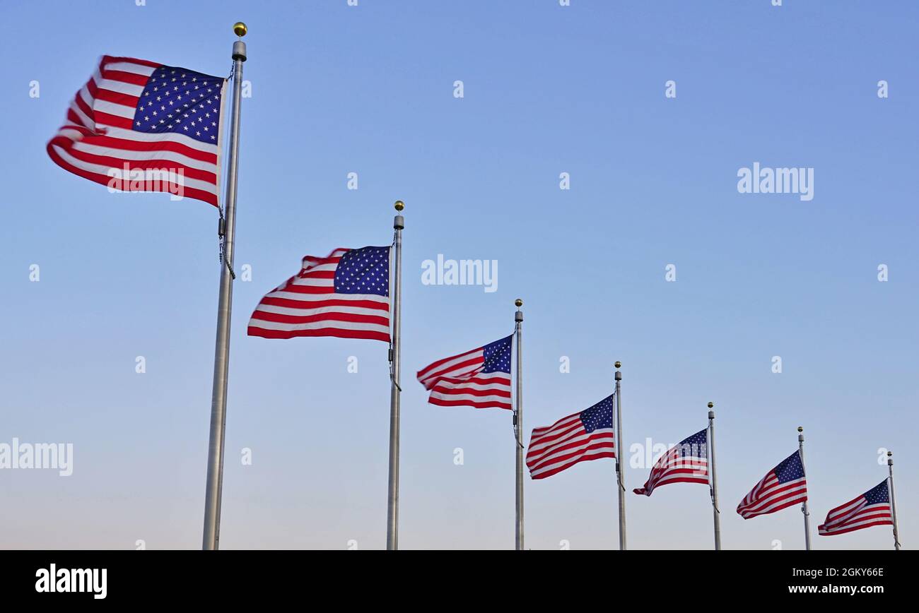 American flag of the United States of America floating in the sky on a ...
