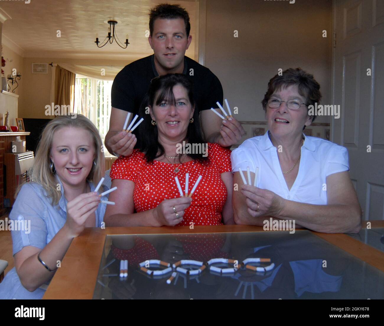 the family that saved £10,000 in one year by giving up smoking. Front l ...