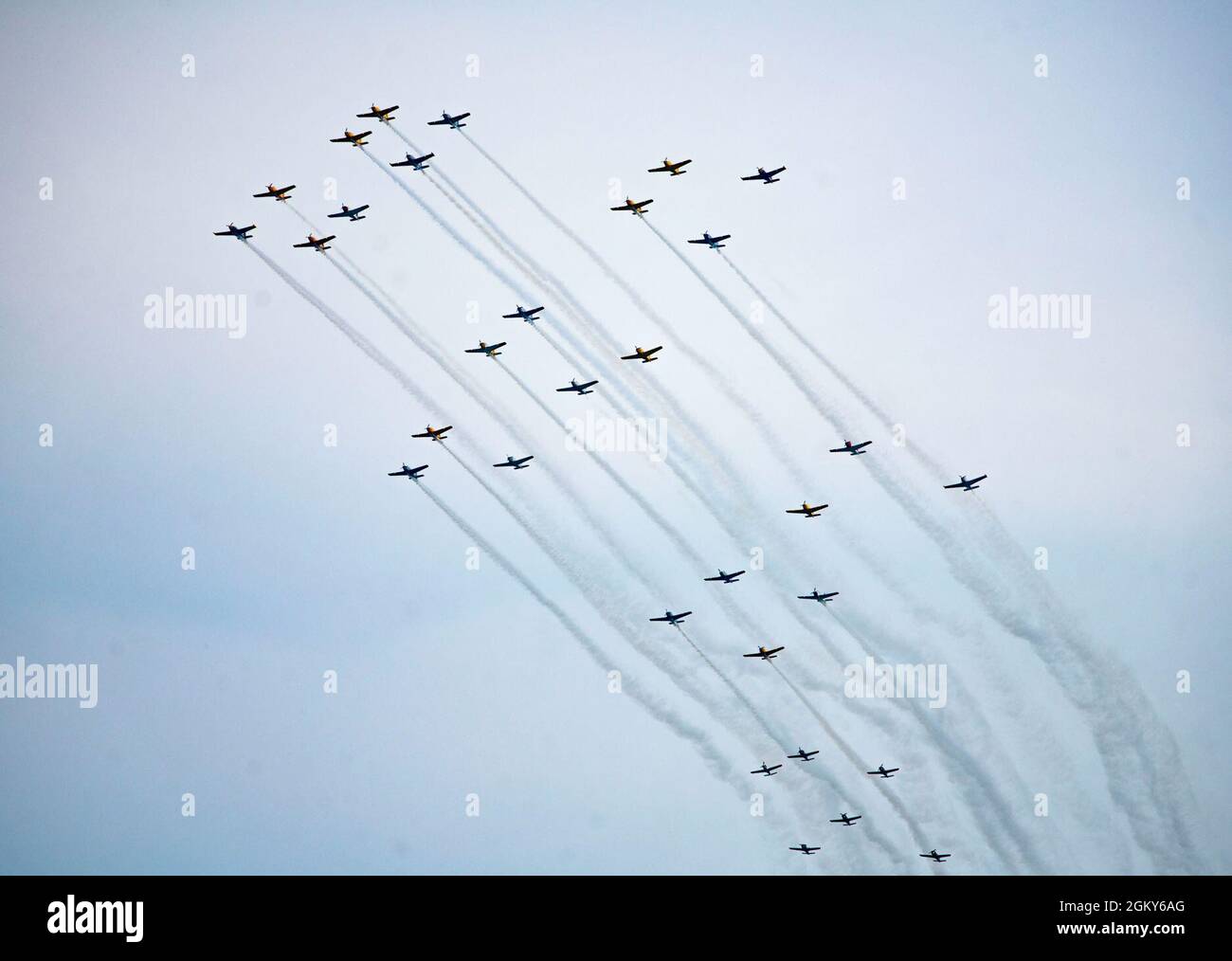 Various legacy aircraft with the EAA Warbirds of America conduct a mass ...