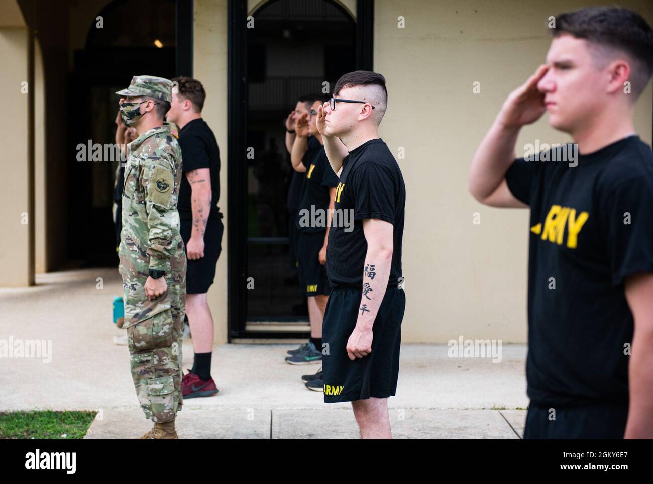 U.S. Army soldiers participating in Exercise Forager 21 render salutes ...