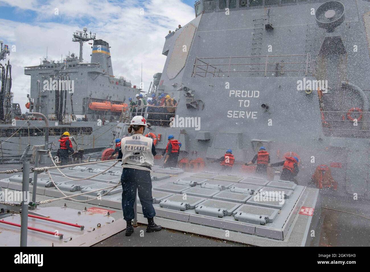 SOUTH CHINA SEA (July 26, 2021) Sailors aboard Arleigh Burke-class ...
