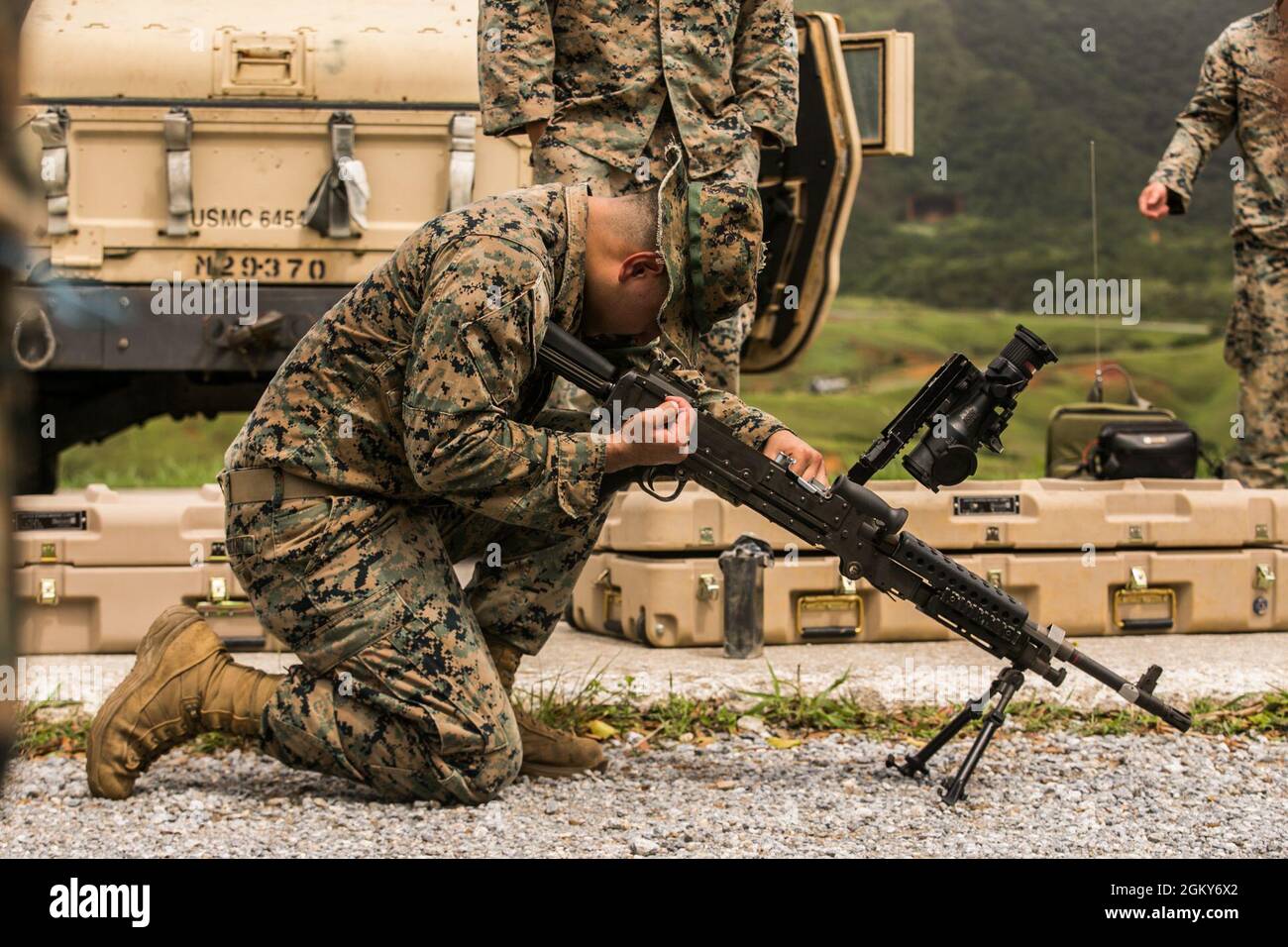 U.S. Marine Corps Lance Cpl. Miguel Medrano, a machine gunner with Fox ...