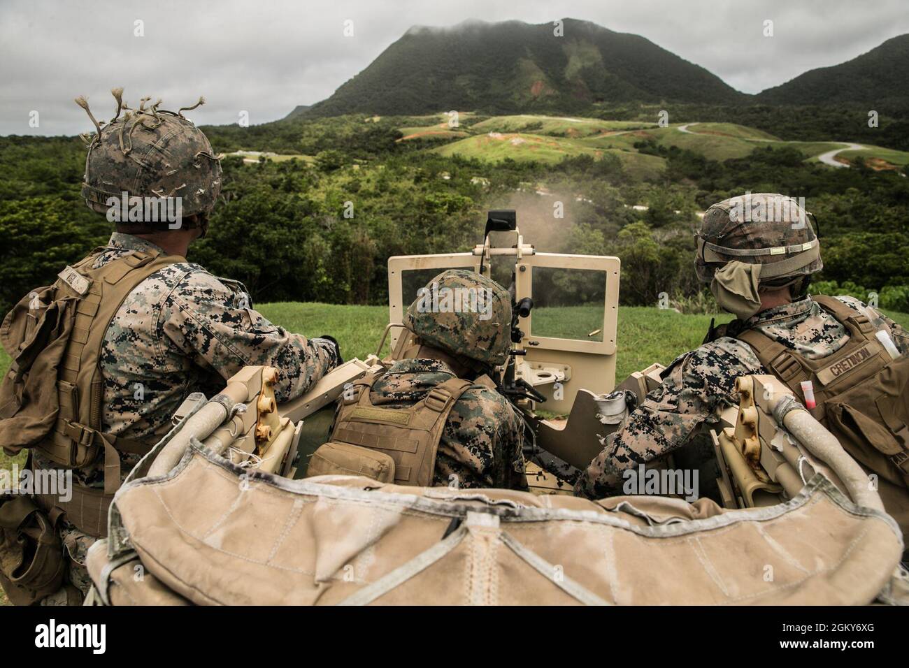 U.S. Marine Cpl. Cpl. Jacob Vigil, left, a team leader with Fox Company ...