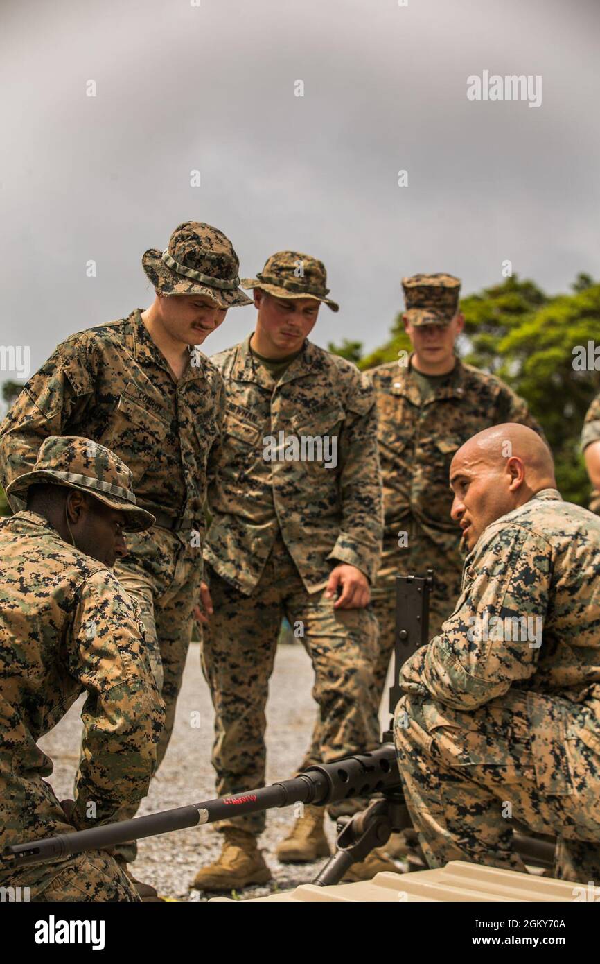 U.S. Marine Corps Cpl. Idan Urrutiagarces, right, a section leader with ...