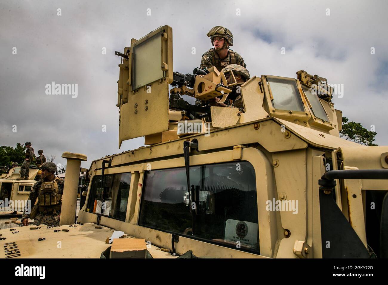 U.S. Marine Corps Cpl. Max Saxer, left, a landing support specialist ...