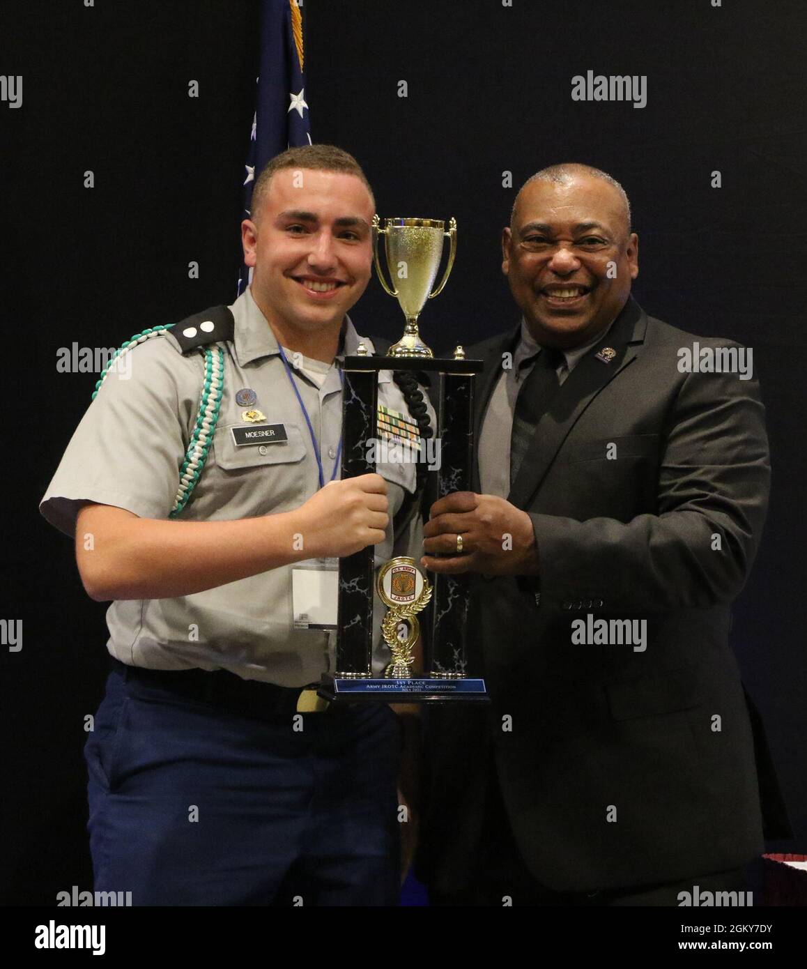 Army Cadet Matteo Moesner, from Xavier High School, accepts the first ...