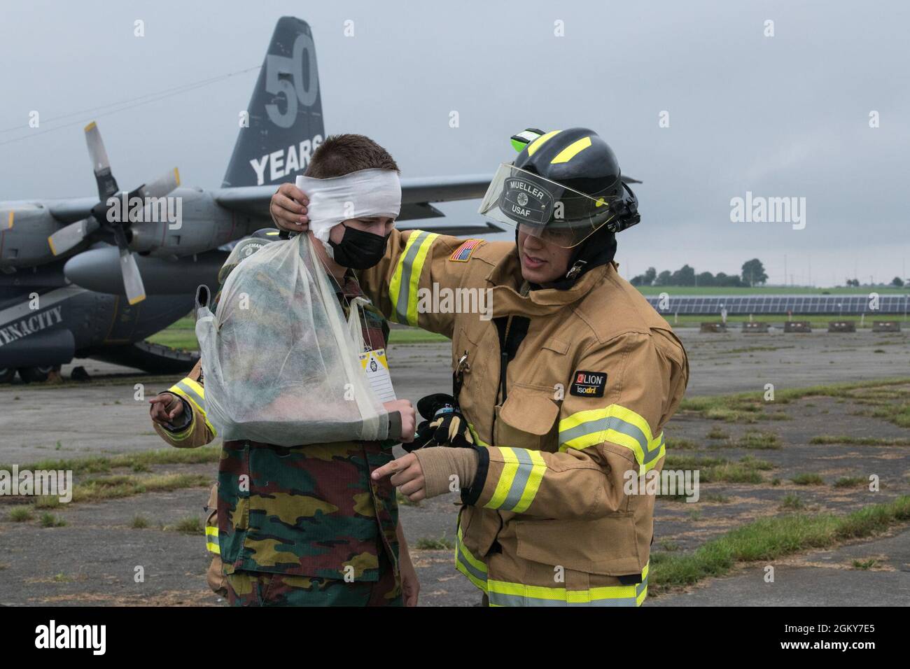 U.S. Air Force Firefighter, Senior Airman Trenton Mueller, with the ...