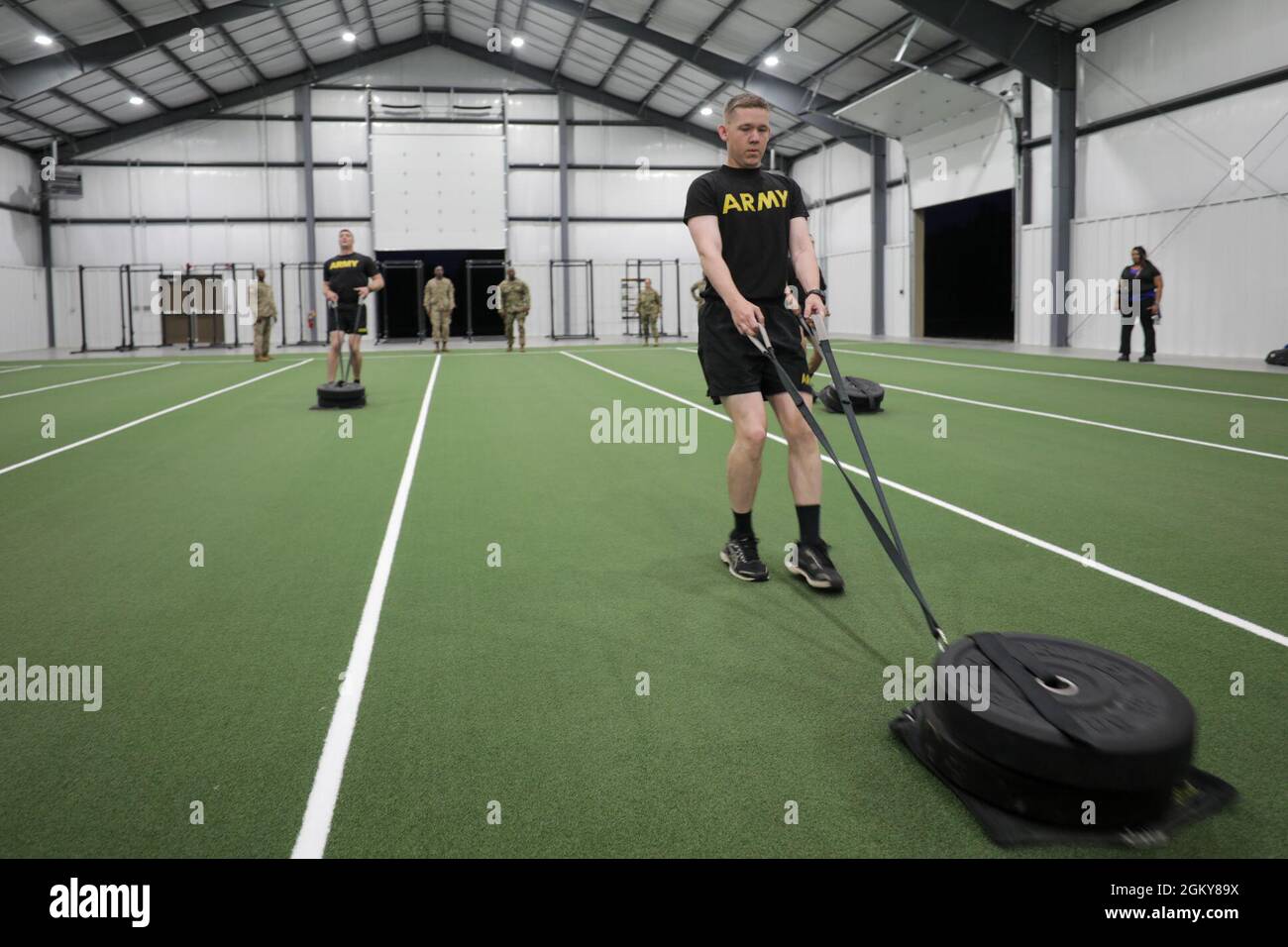 A Soldier completes the sprint-drag-carry event portion of the Army ...