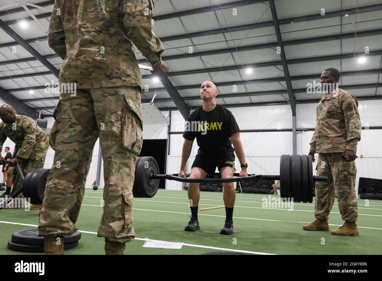 Sgt. 1st Class Tyler Price completes the three repetition maximum ...