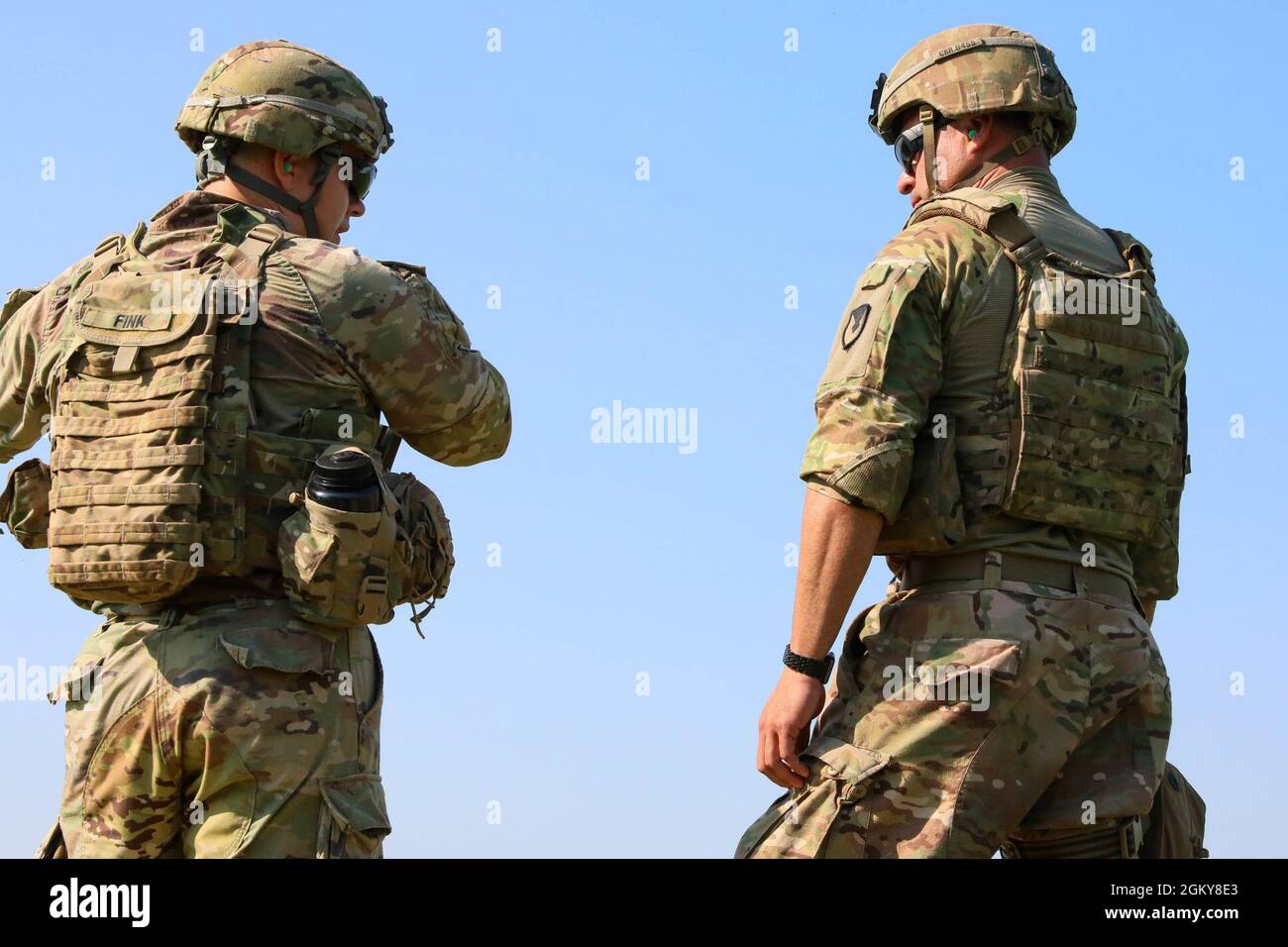 Staff Sgt. Devin Fink prepares for the M4 qualification event at the ...