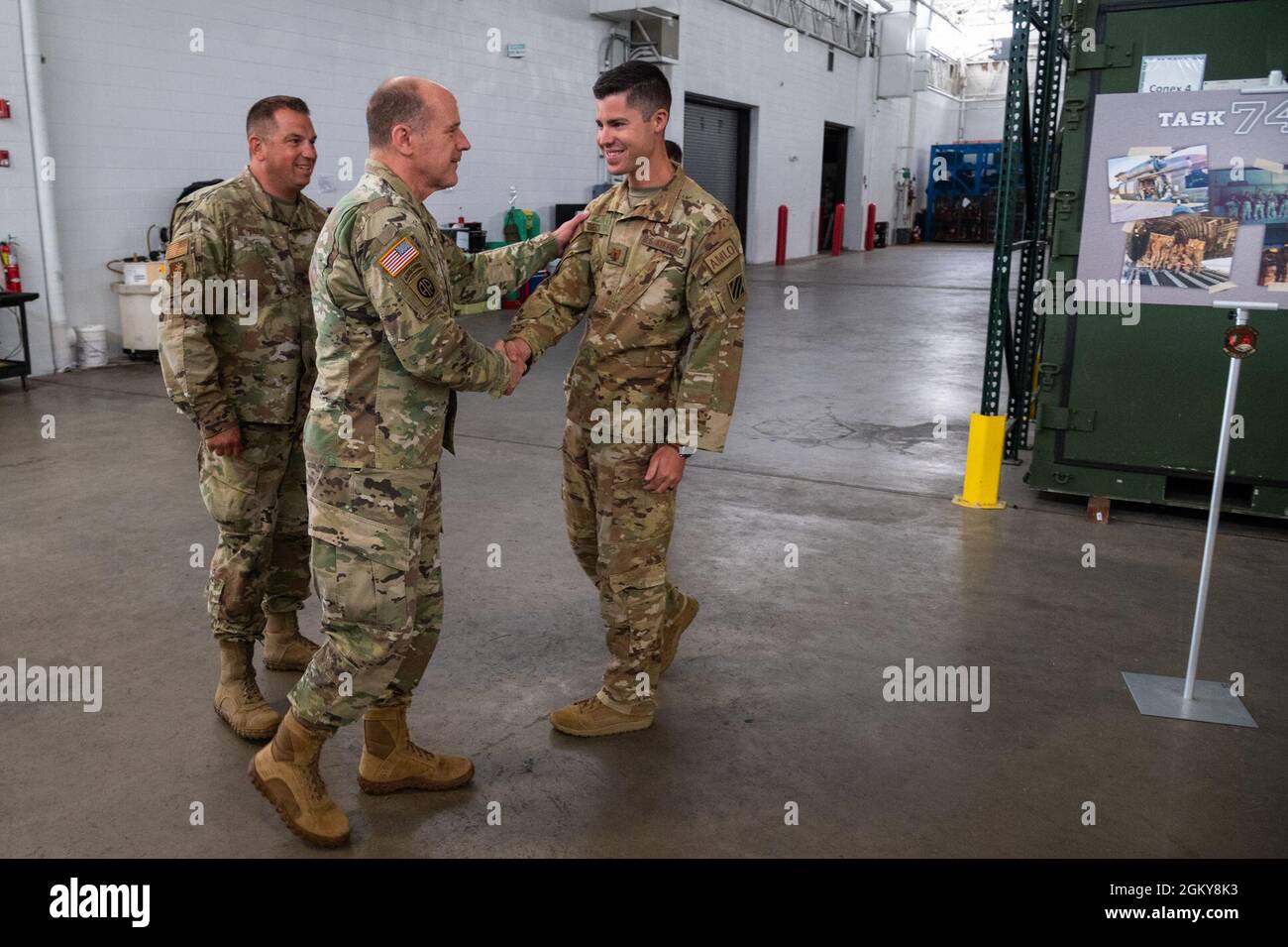 U.S. Air Force Col. Travis Edwards, middle, 621st Contingency Response ...