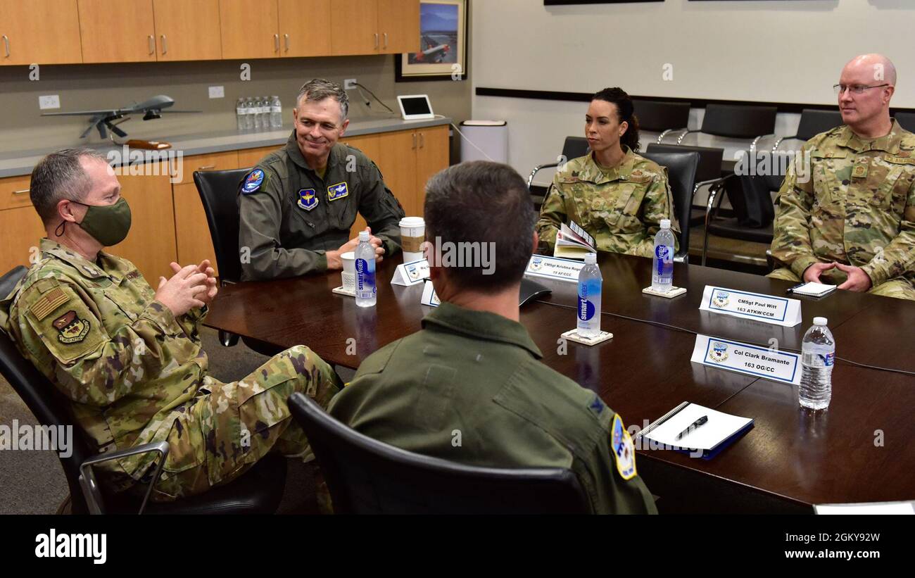 U.S. Air Force Maj. Gen. Craig D. Wills, second from left, the 19th Air ...