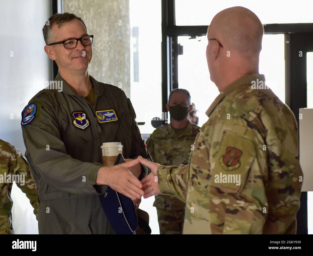 U.S. Air Force Maj. Gen. Craig D. Wills, left, the 19th Air Force ...