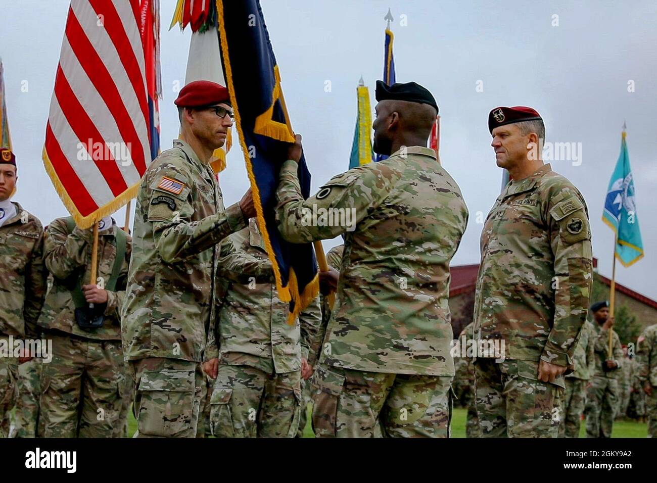 Maj. Gen. Xavier Brunson, Commander I Corps, center, passes Maj. Gen ...