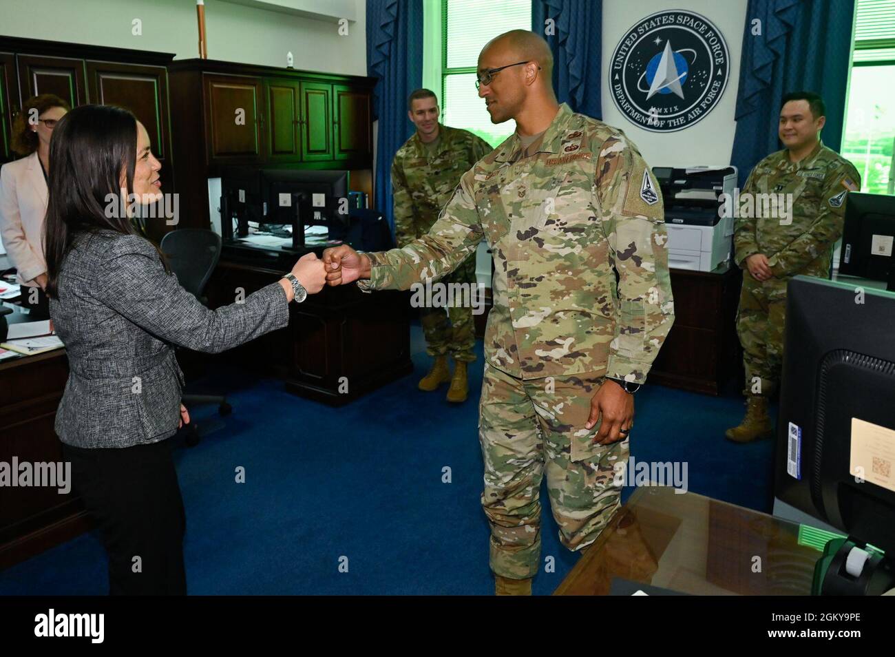 Under Secretary of the Air Force Gina Ortiz Jones greets staff for ...