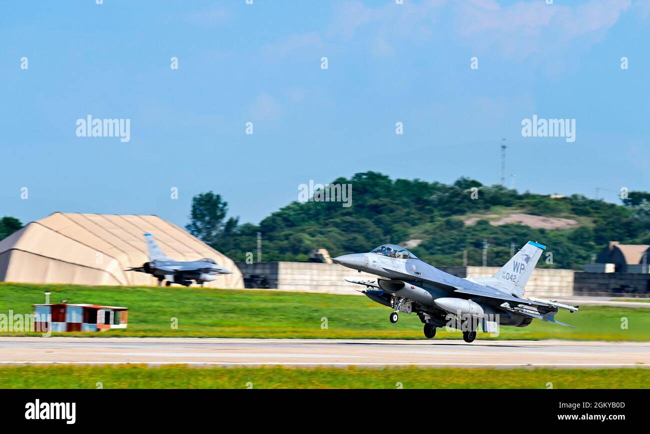 An F-16 Fighting Falcon from the 35th Fighter Squadron takes off on the ...
