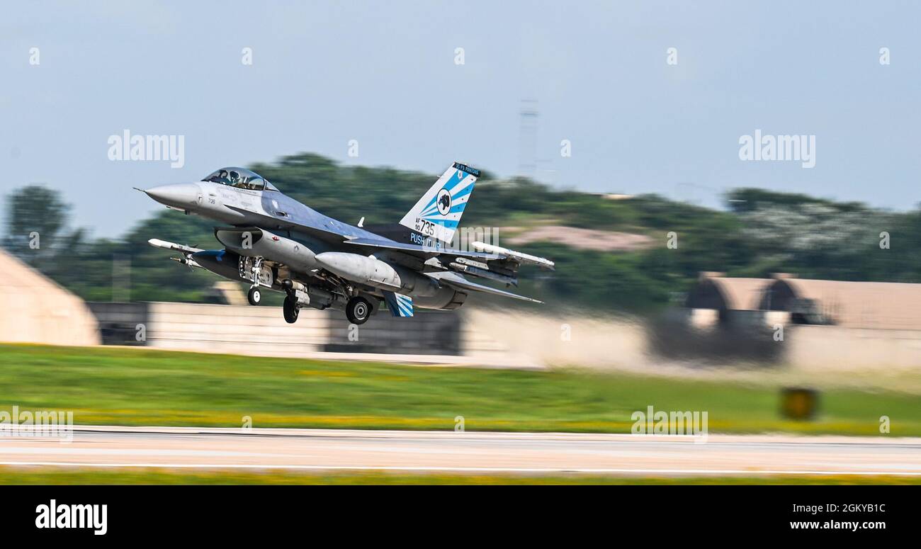 An F-16 Fighting Falcon from the 35th Fighter Squadron lifts off of the ...