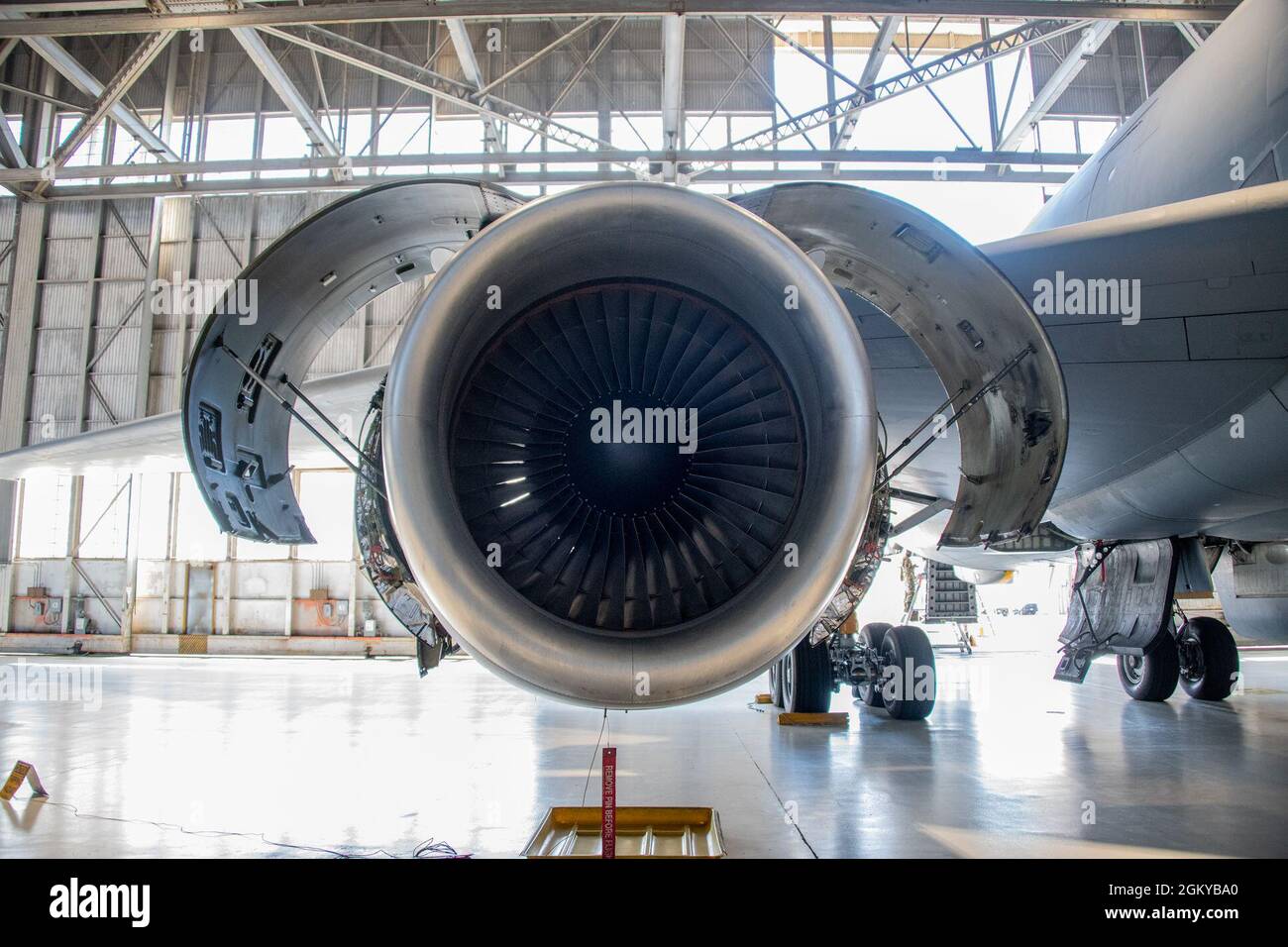 A KC-10 Extender engine is serviced inside a hangar July 27, 2021, at ...