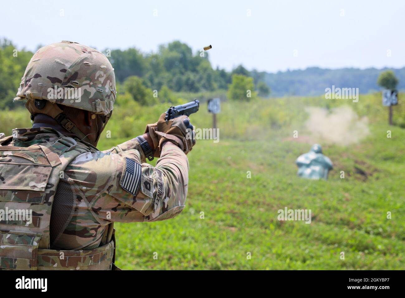 Sgt. 1st Class Jonathan Tyndall complete the M9 pistol qualification ...