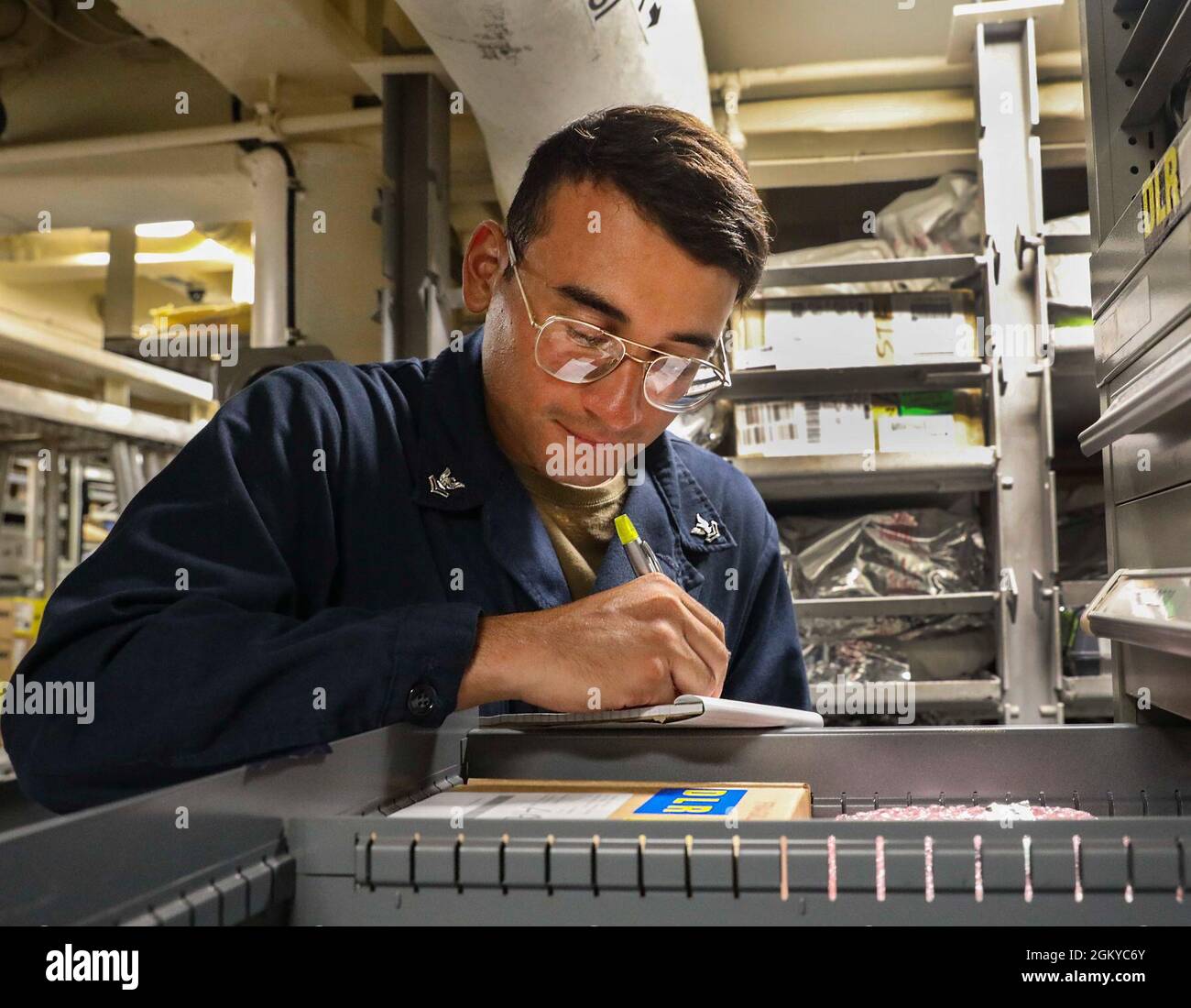 Logistics Specialist 2nd Class Henrry Diaz, from Bronx, N.Y., conducts ...