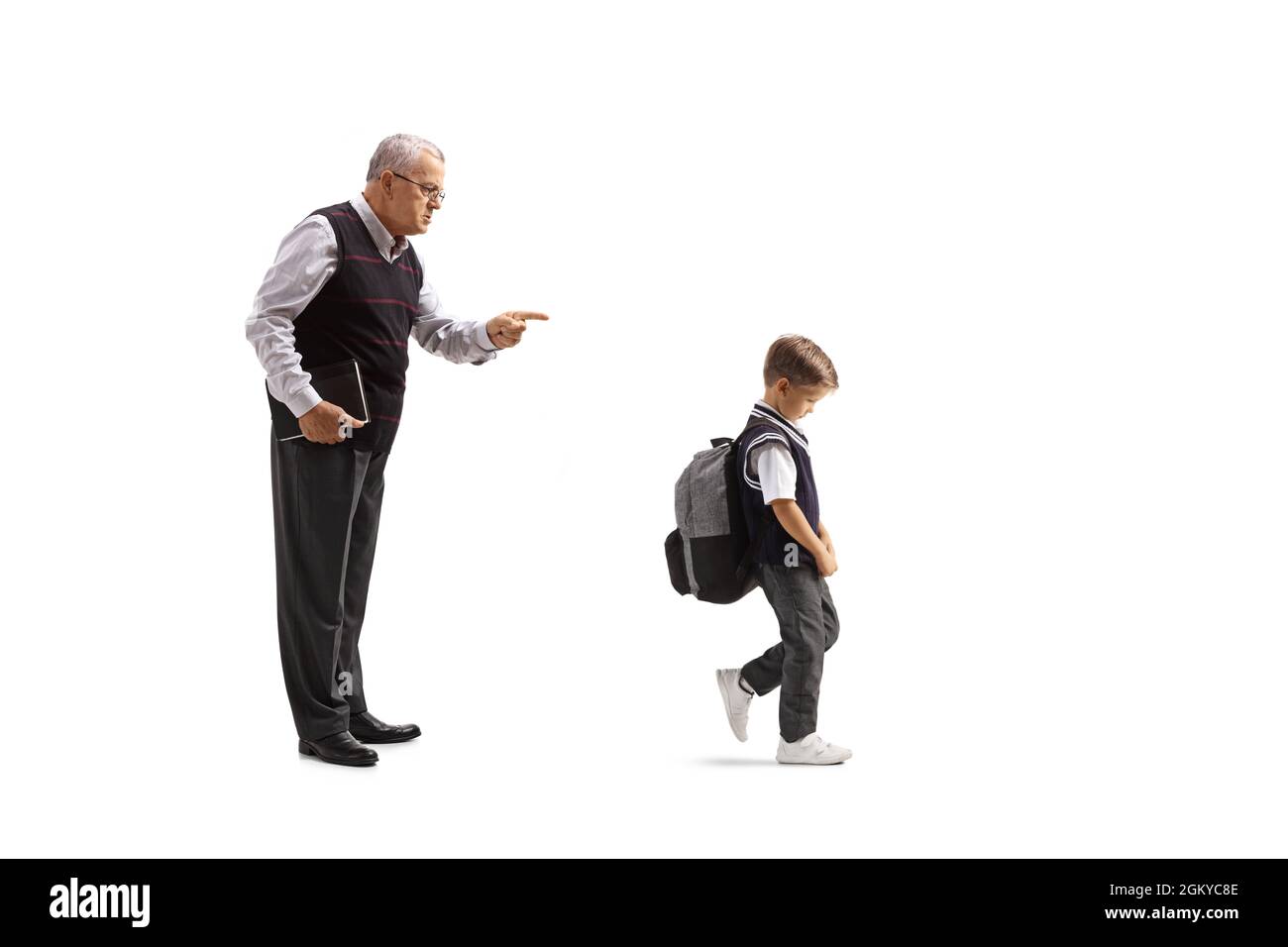 Teacher reprimending a schoolboy in a uniform walking isolated on white ...