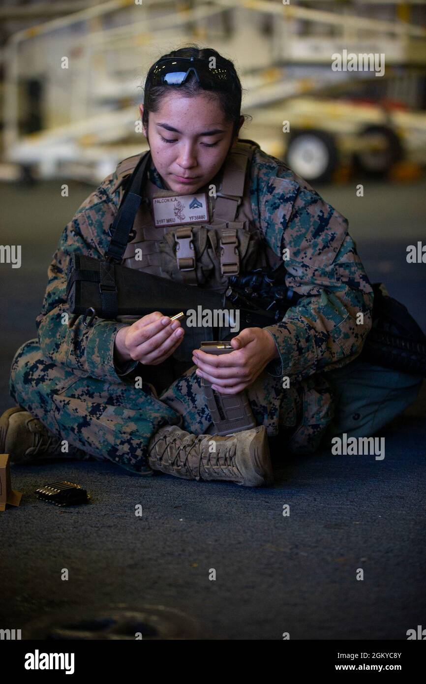 U.S. Marine Corps Cpl. Katherine Falcon, a Chemical Biological ...