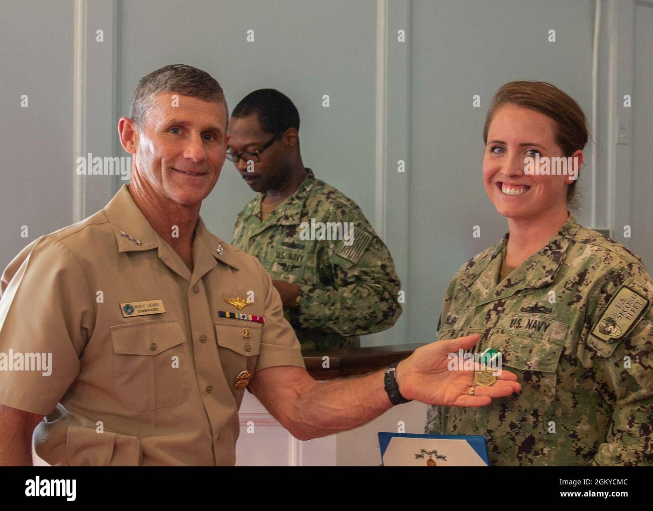 NORFOLK, Va. (July 28, 2021) Lt. Mary Walsh is awarded a Navy and ...
