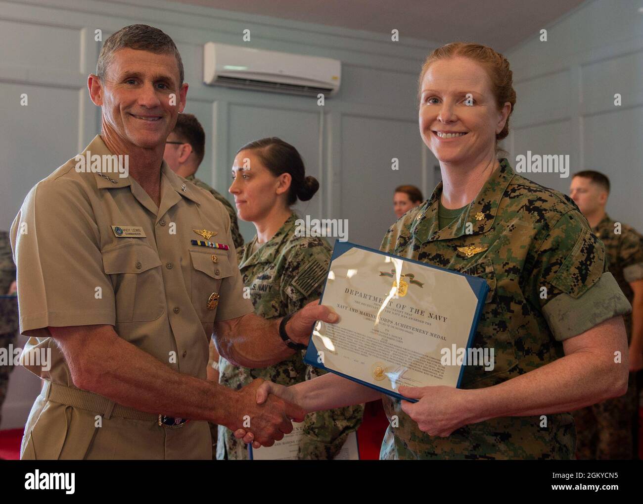 NORFOLK, Va. (July 28, 2021) Major Natalie Hancock receives a Navy and ...