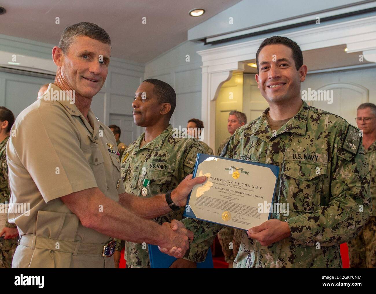 NORFOLK, Va. (July 28, 2021) Lt. Daniel Segovia receives a Navy and ...