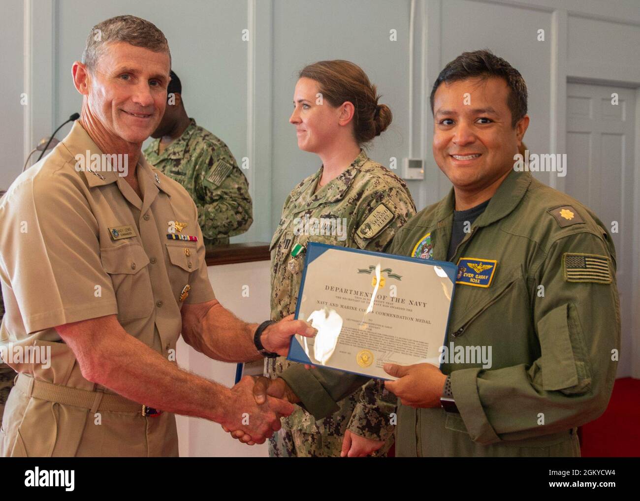 NORFOLK, Va. (July 28, 2021) Lt. Cmdr. Ever Garay receives a Navy and ...