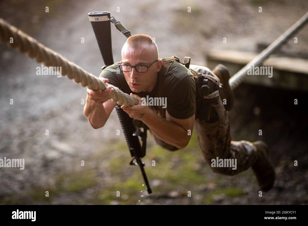 A U.S. Marine Corps officer candidate with Alpha Company navigates ...