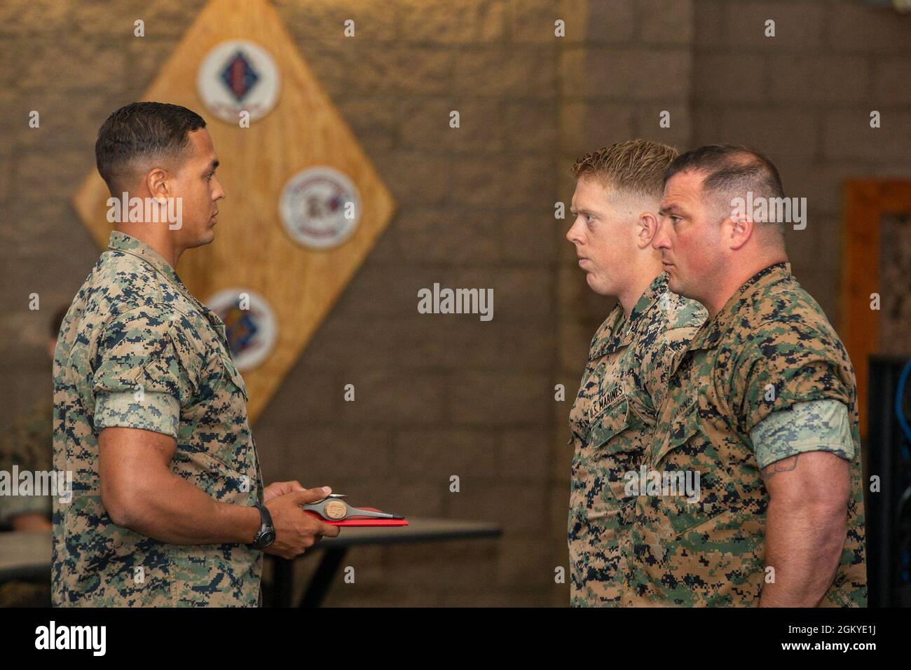 U.S. Marine Lance Cpl. Steven Criniti, left, a student with the ...