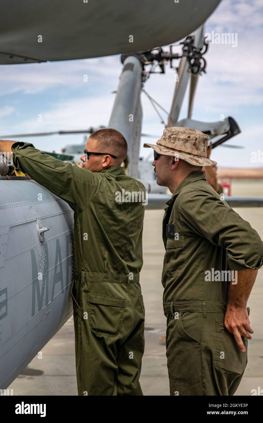 Marines with Marine Light Attack Helicopter Squadron (HMLA) 773 perform ...