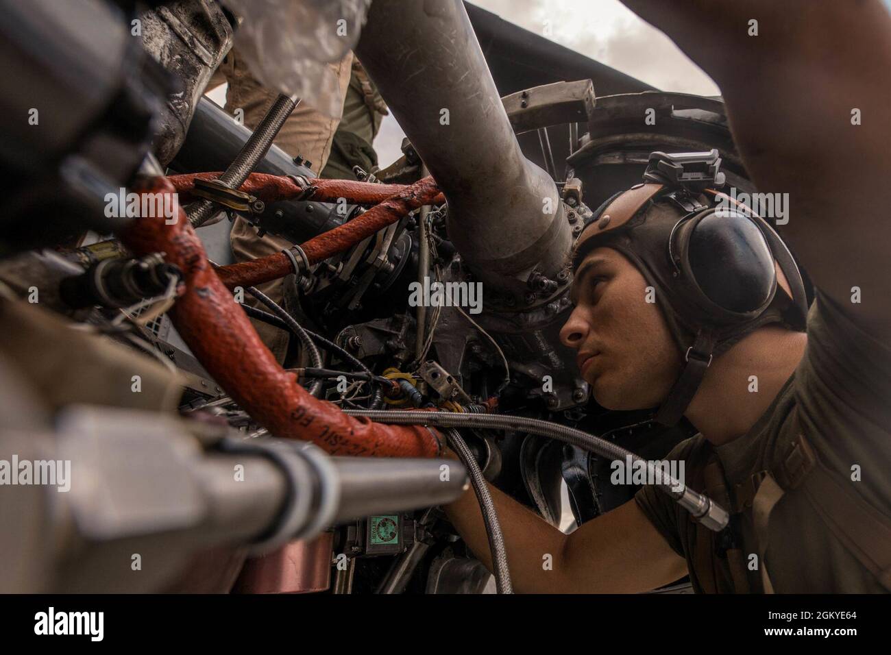 A U.S. Marine with Marine Heavy Helicopter Squadron (HMH) 772 performs ...