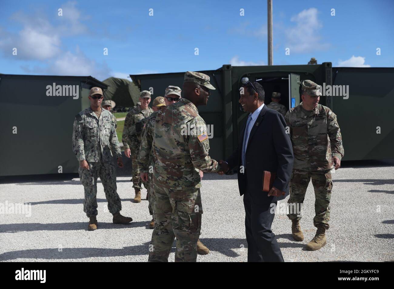 Dr. Raj Iyer, chief information officer for the U.S. Army, greets Maj ...