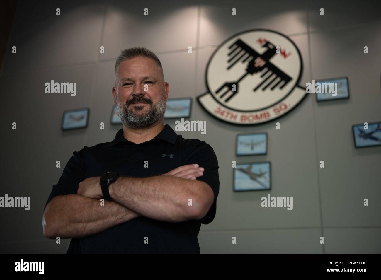 Tom Brack, 34th Bomb Squadron unit deployment manager, poses in front ...