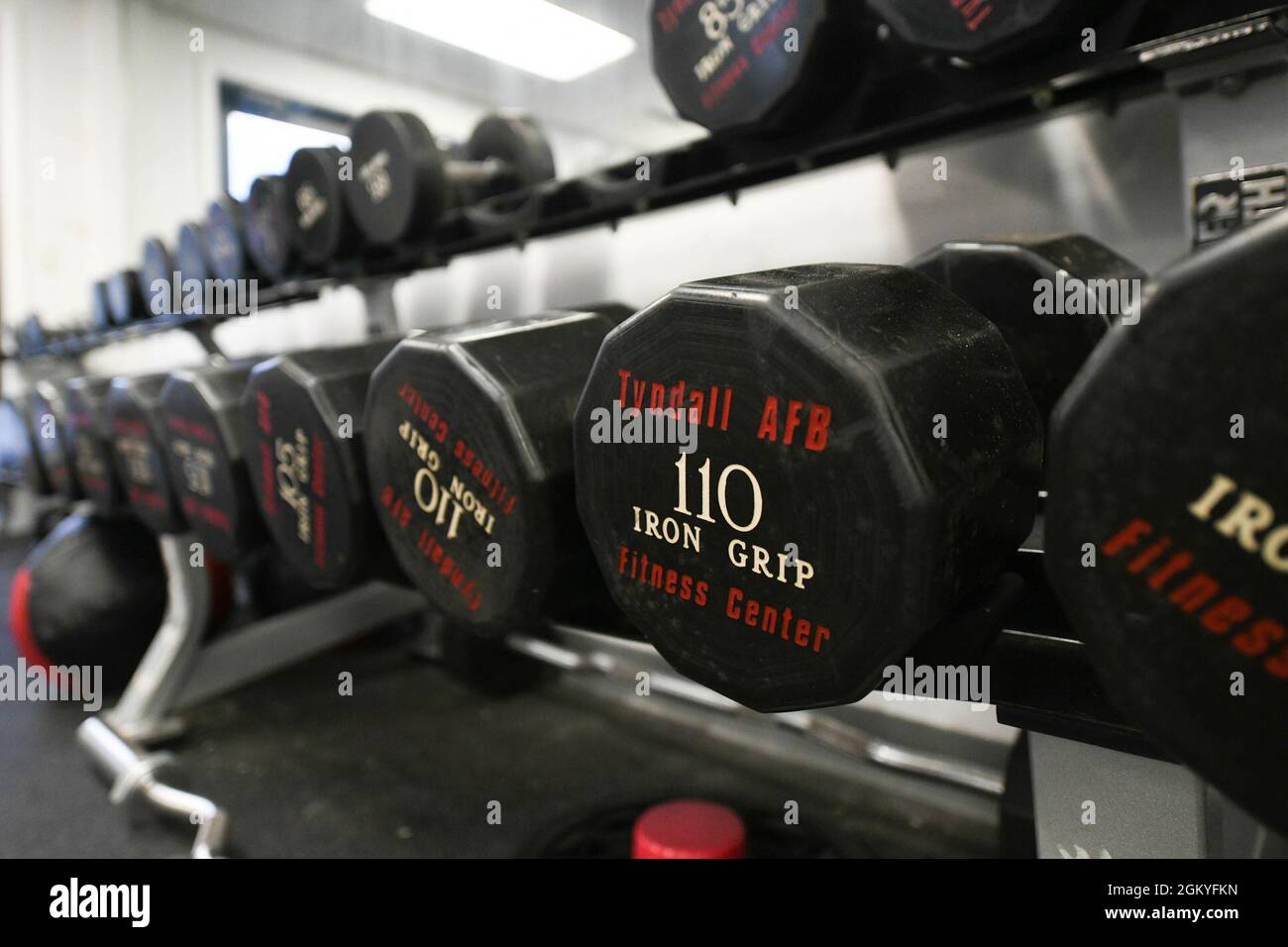Weights sit on a rack at the Fire Department at Tyndall Air Force Base ...