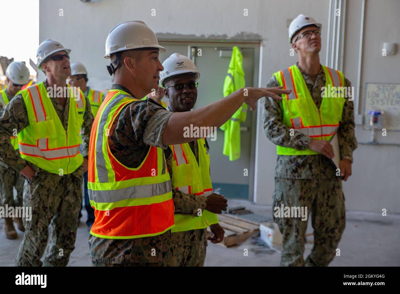 Lt. Col. Tate Buntz, the Marine Corps Base (MCB) Camp Blaz Operations Officer, briefs U.S. Navy ...