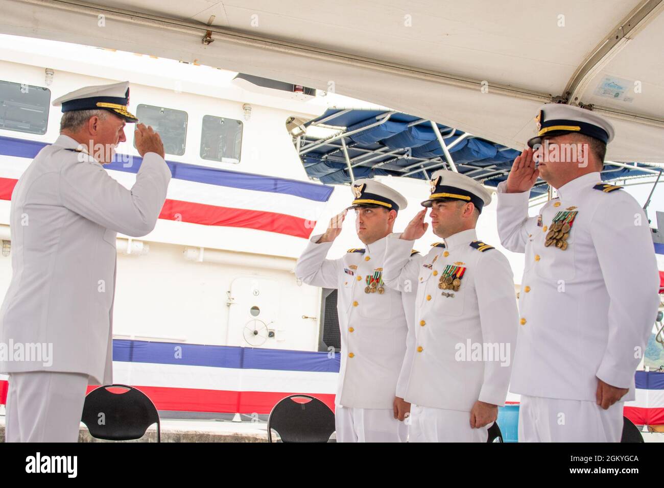 Three commanding officers of newly commissioned fast response cutters ...