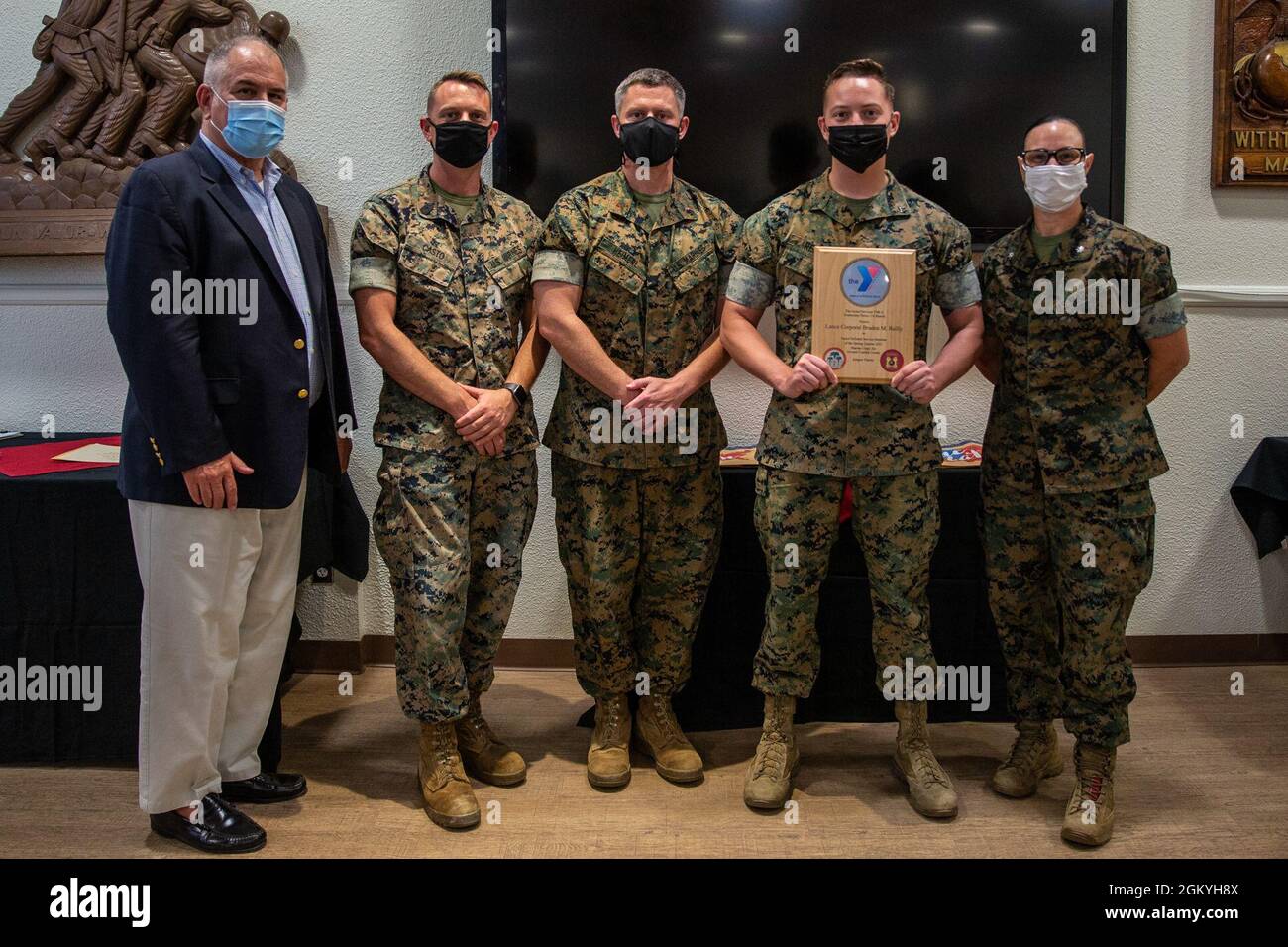 From left, Patrick Byrne, executive director, Armed Services Young Men ...