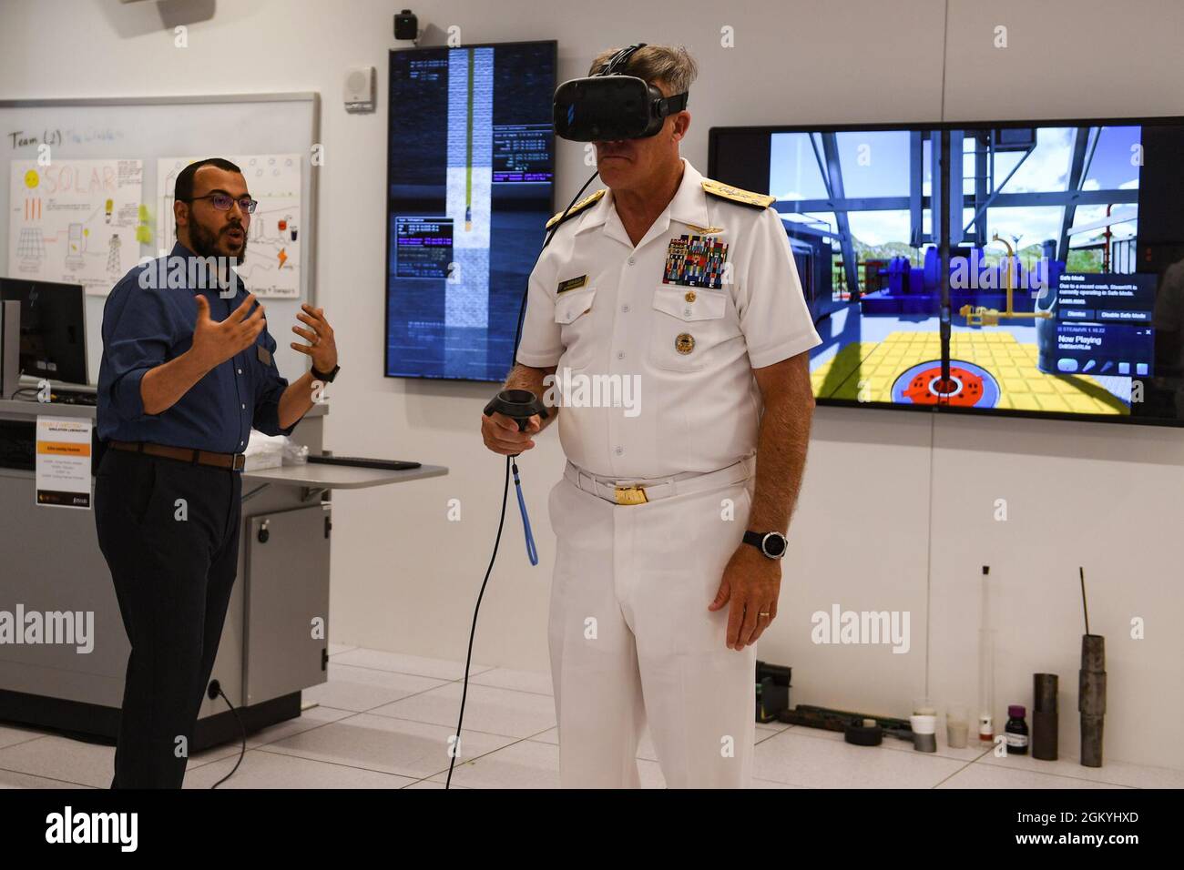 Vice Adm. Sean Buck, superintendent of the U.S Naval Academy, learns ...