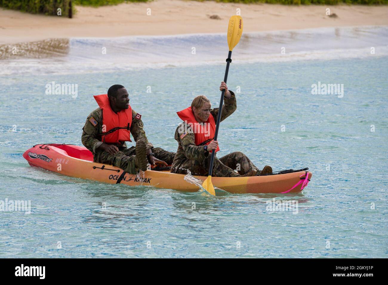 U.S. Army Staff Sgt. James Gabisum and 1st Lt. Paige Runco, with ...